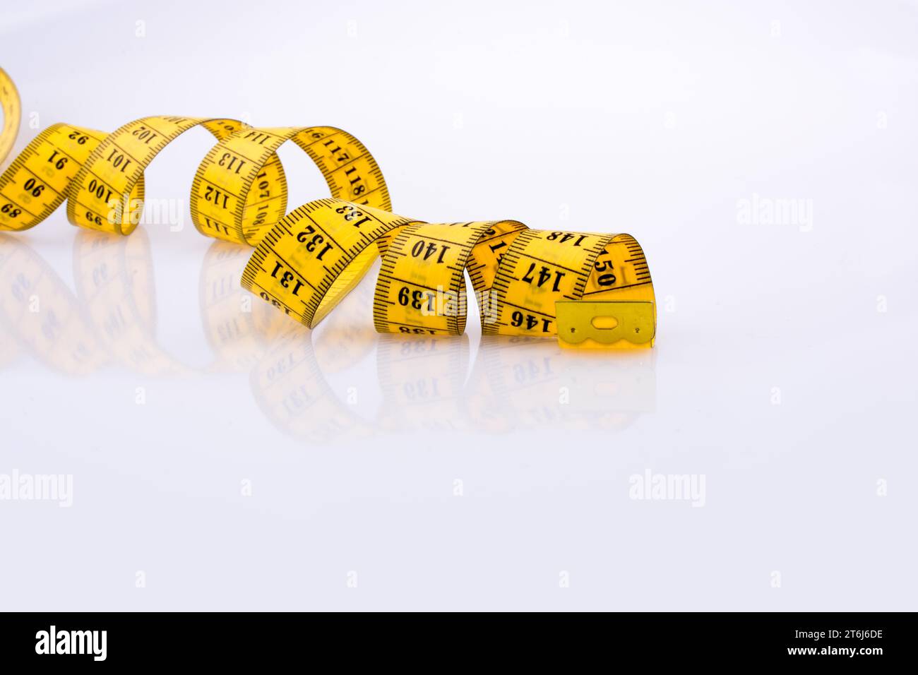 Tape measuring white background hi-res stock photography and images - Alamy