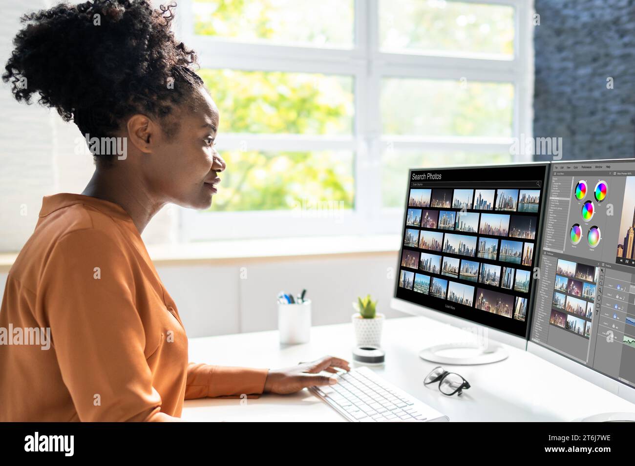 Tech Designer Using Video Editor to Edit Picture Stock Photo - Alamy