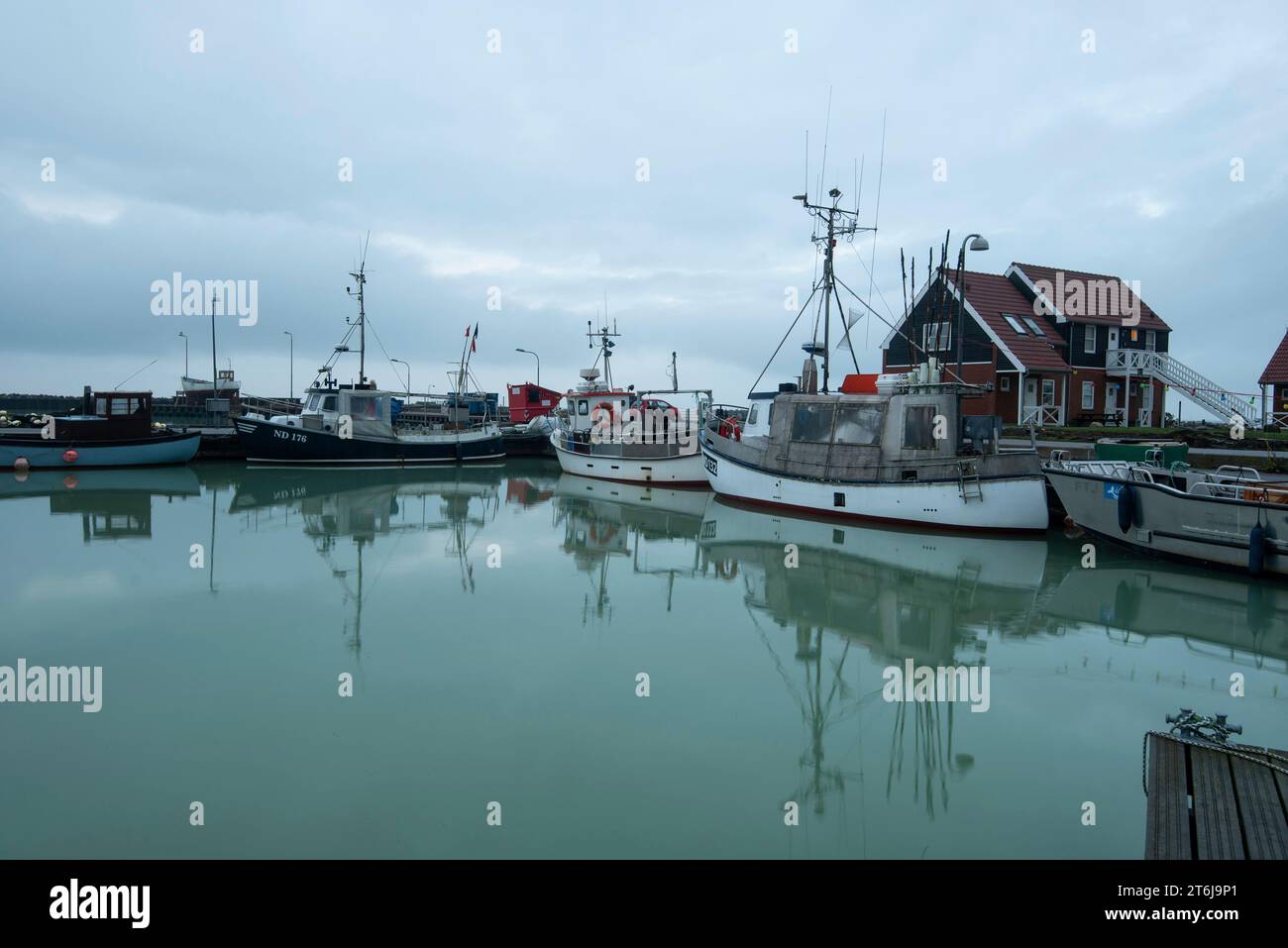 Fishing boats in the harbor of klintholm havn hi-res stock photography ...