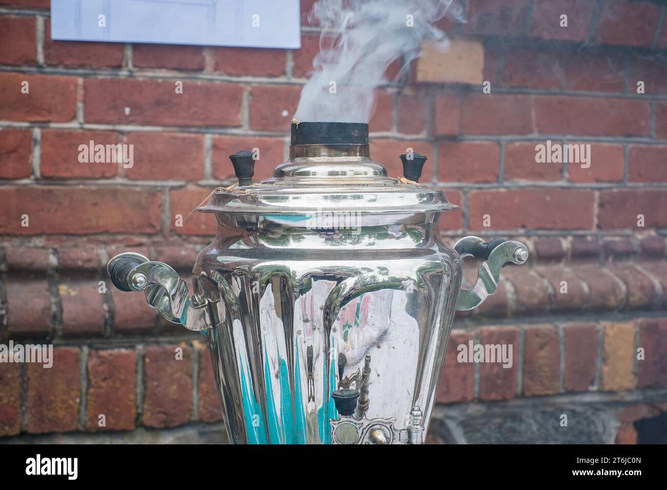 Smoking samovar (English: self-brewer) used to make hot water for tea ...