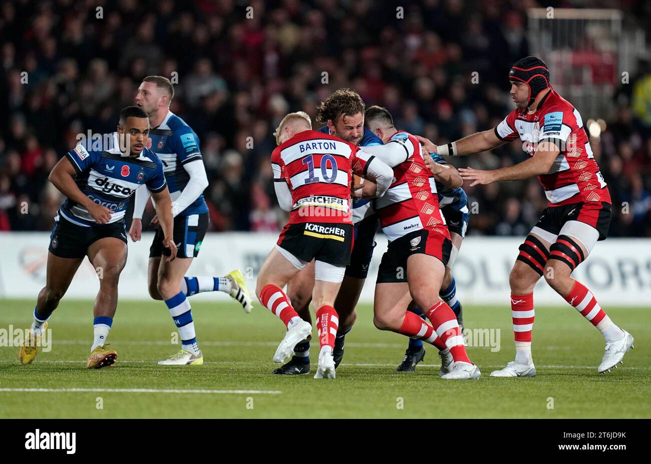 Bath Rugby's William Stuart tackled by Gloucester Rugby's George Barton ...