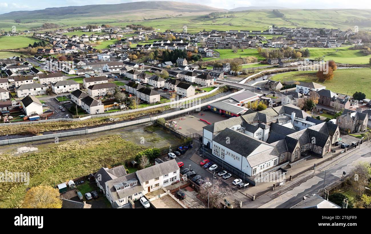 An aerial view of a rural countryside under a bright sky in New Cumnock ...