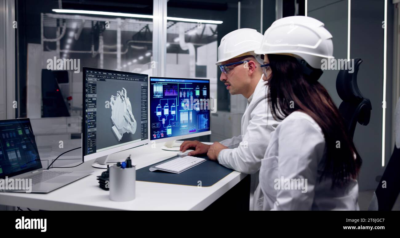 Engineer Doing 3D CAD Model Design On Computer At Factory Stock Photo ...