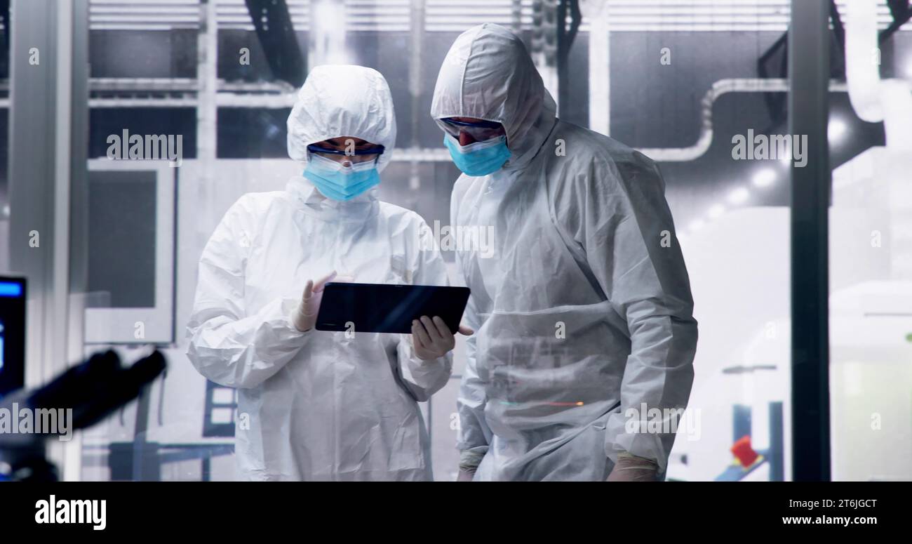 Factory Clean Room Laboratory. Industrial Engineer Using Technology ...