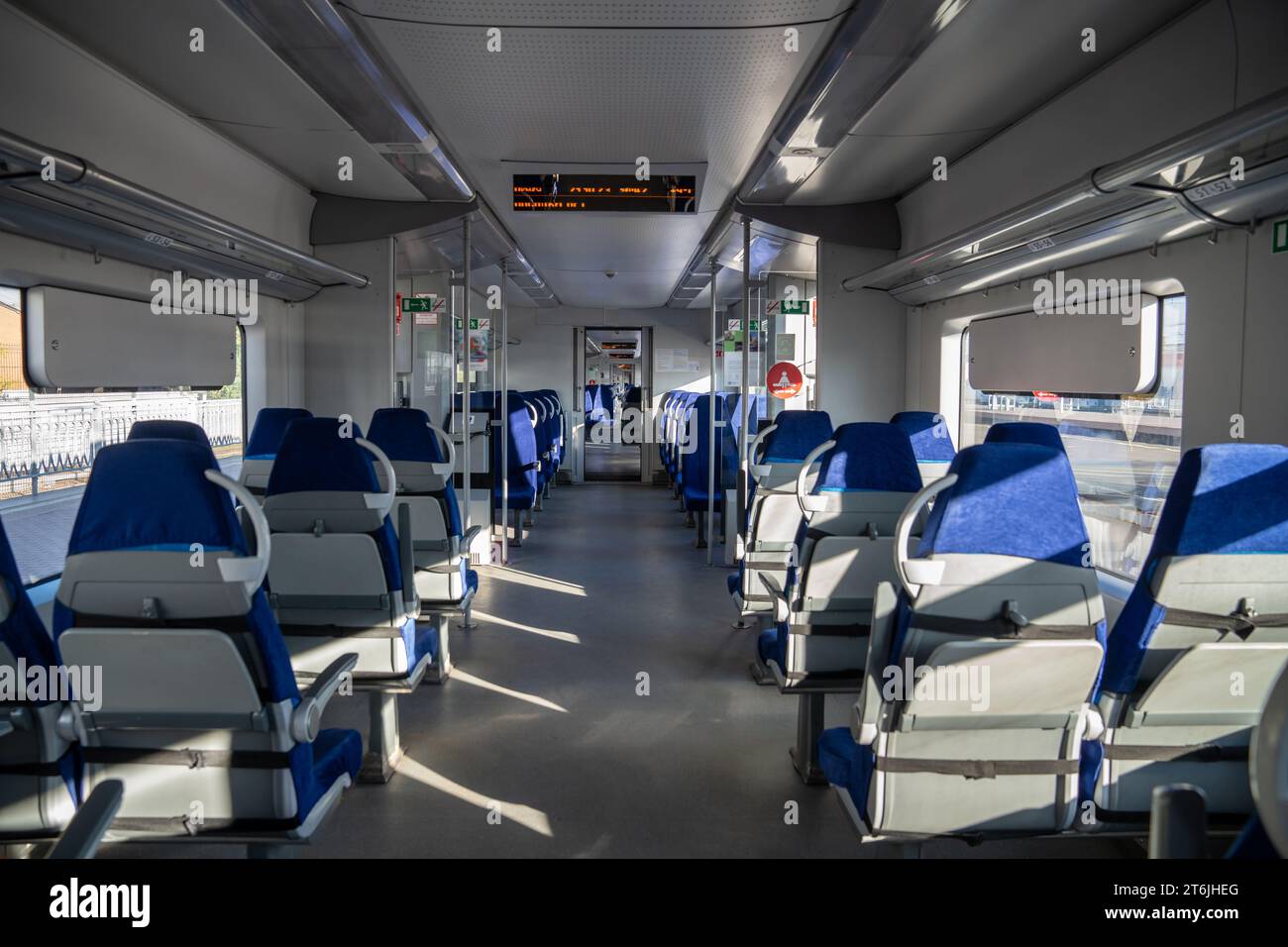 Interior of modern passenger high-speed express train. Inside the train ...