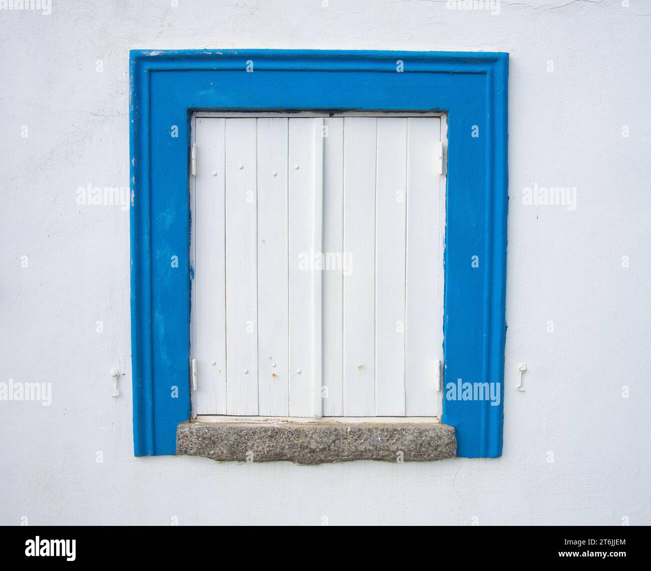 Traditional Algarve window in a typical house in Portimão. Wooden ...