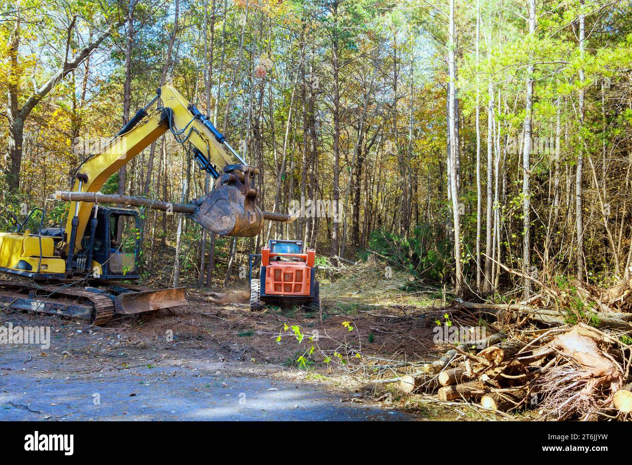 In preparation for constructing new home builder uproots trees from ...