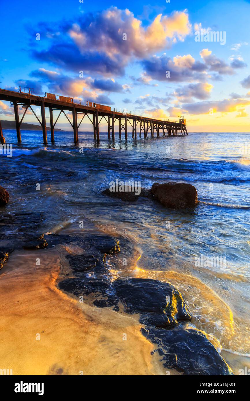 Old historic timber coal loader jetty at Middle camp beach in Catherine ...
