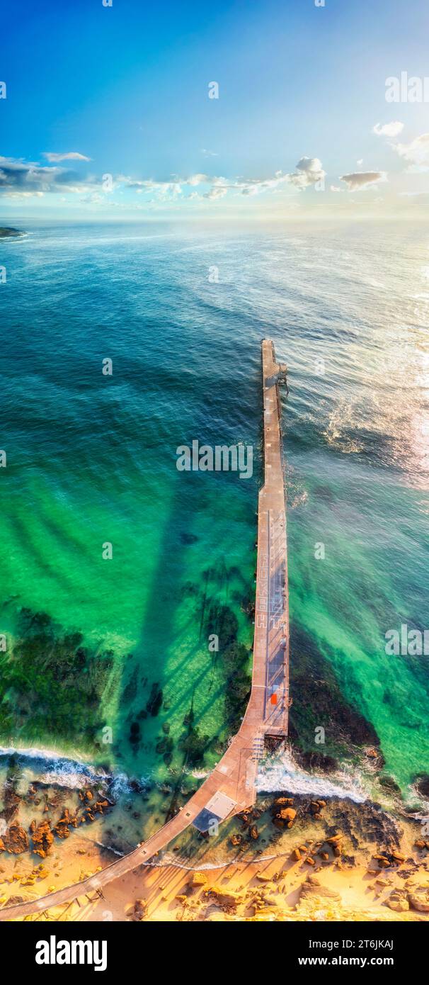Long historic timber jetty at Middle camp beach on Australian Pacific ...