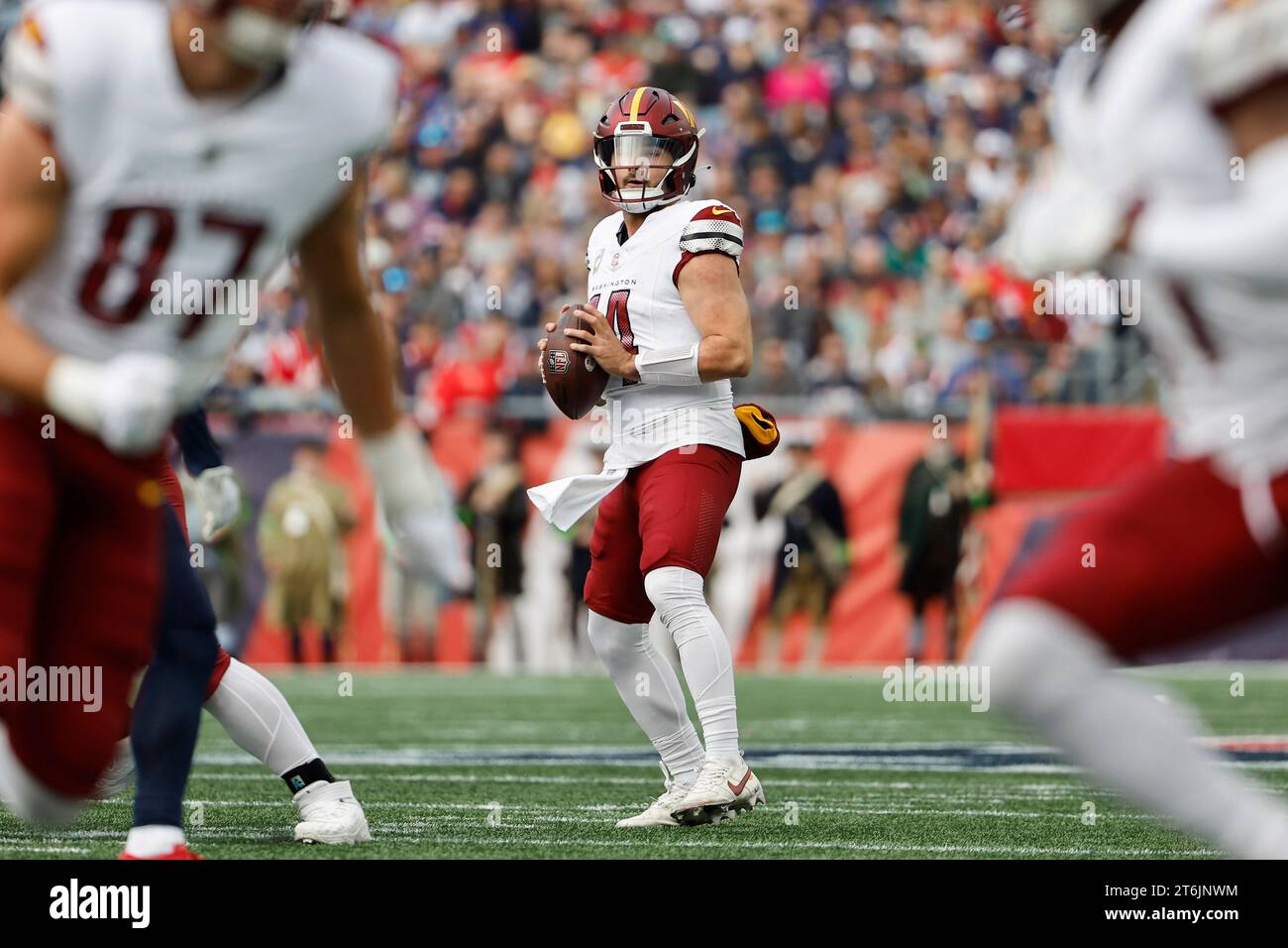 Washington Commanders quarterback Sam Howell drops back to pass against ...