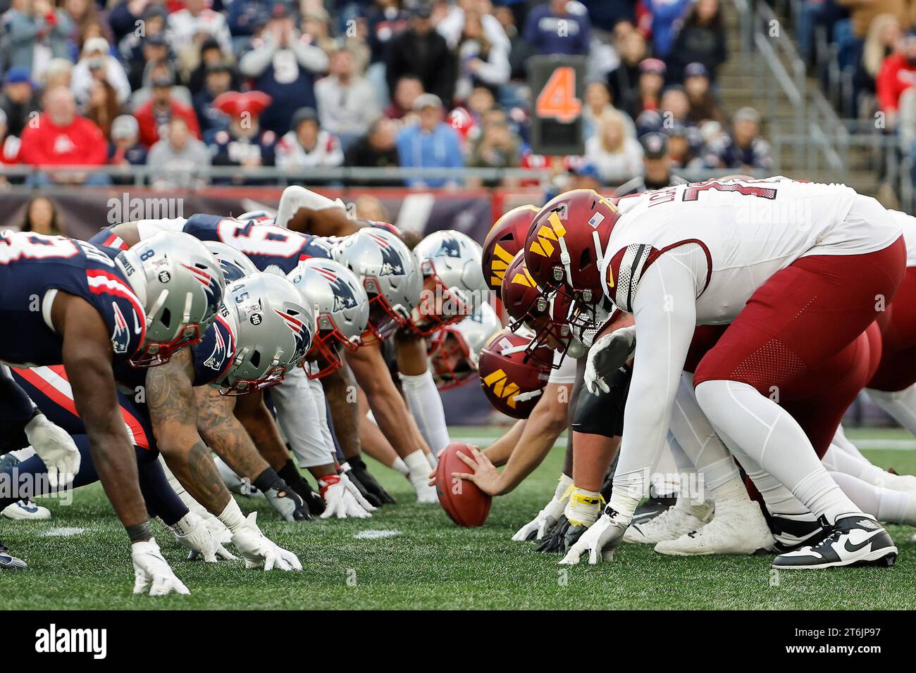 The New England Patriots and the Washington Commanders line up for the ...
