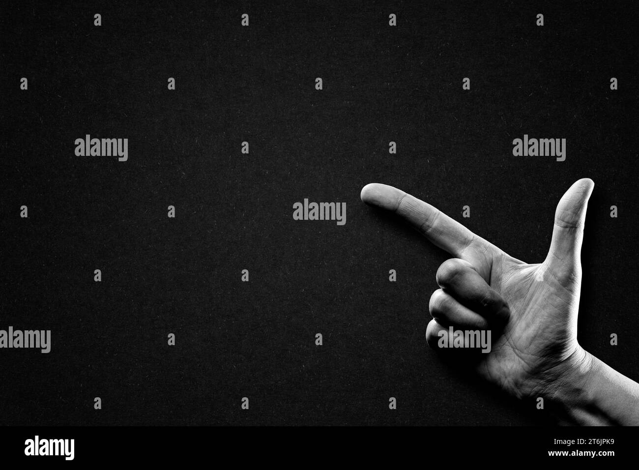 Hand Pointing Sign in Black and White on Textured Paper Background ...