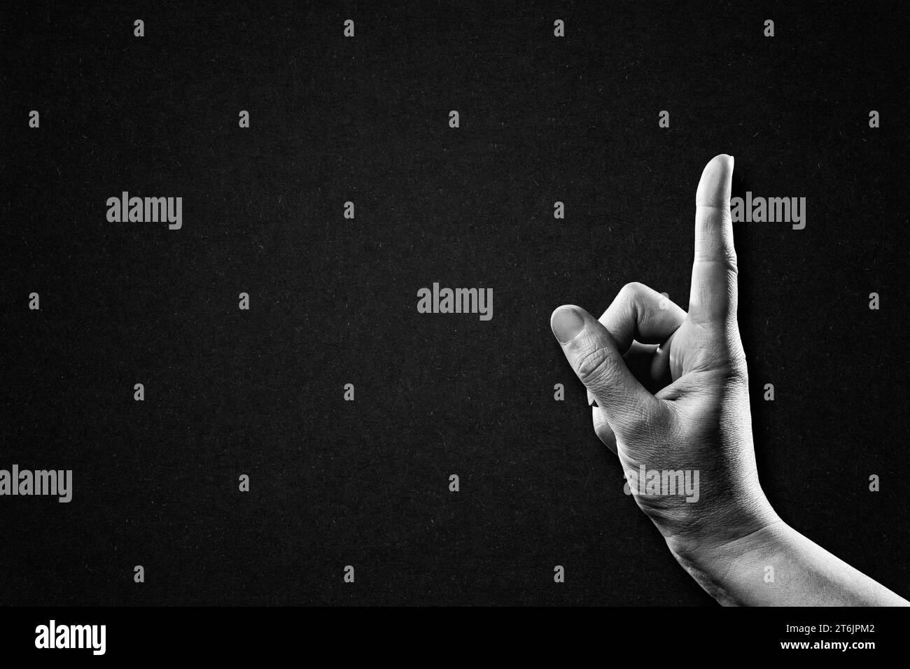 Hand Finger Pointing Sign in Black and White on Textured Paper ...