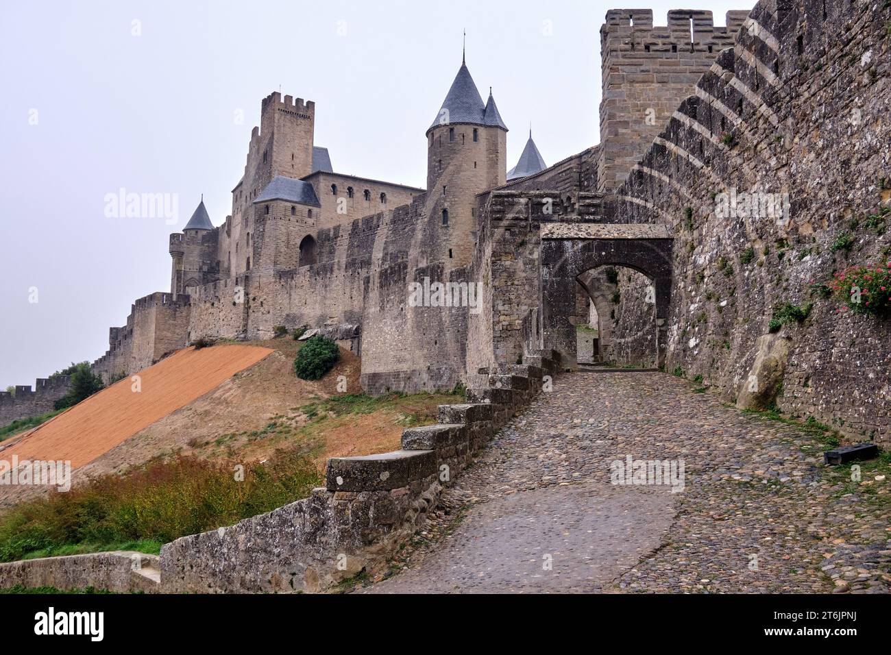 West entrance to the castle of Carcassonne in France with visible ...
