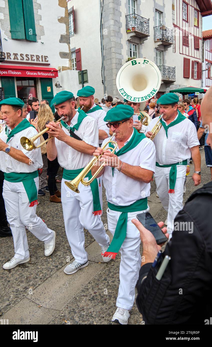 Local Basque orchestra marching at the market during pepper festival in ...