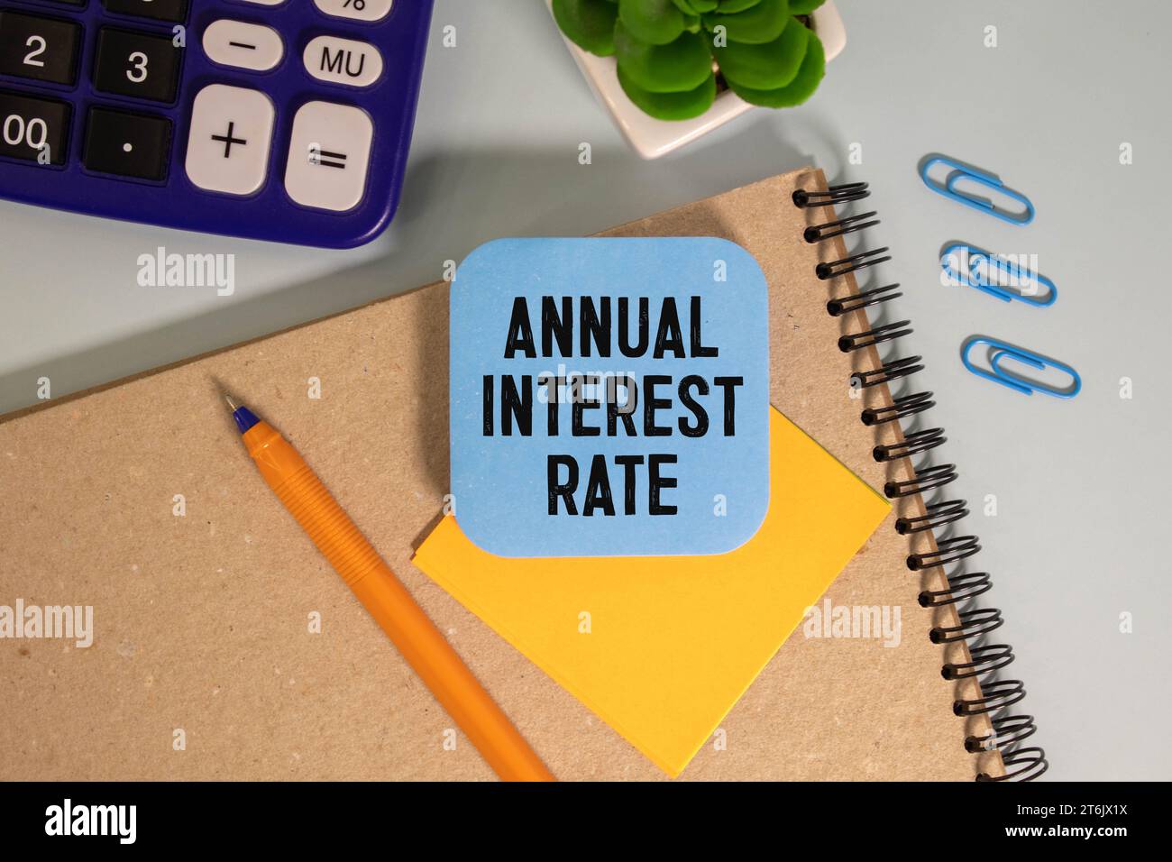ANNUAL INTEREST RATE, text on notepad page on gray background Stock ...