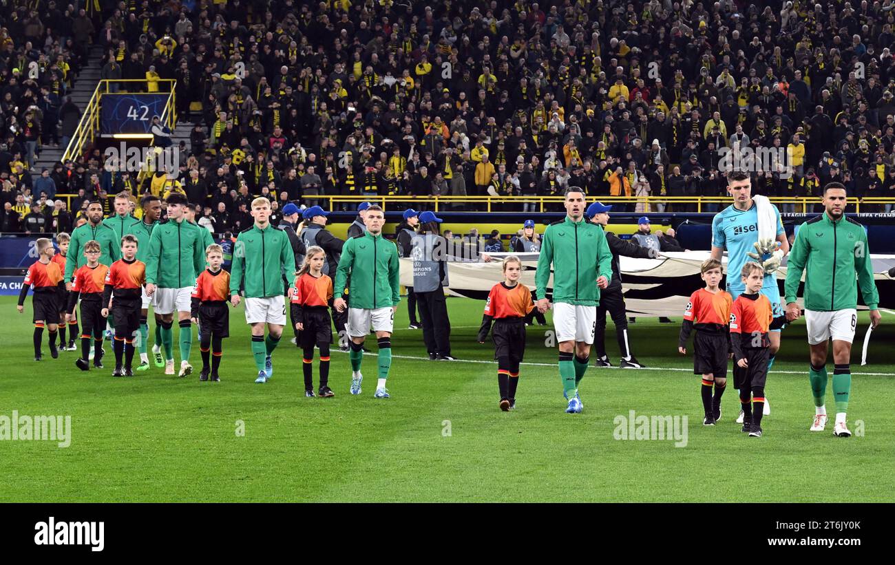DORTMUND - Newcastle United FC players on their way to the line up ...