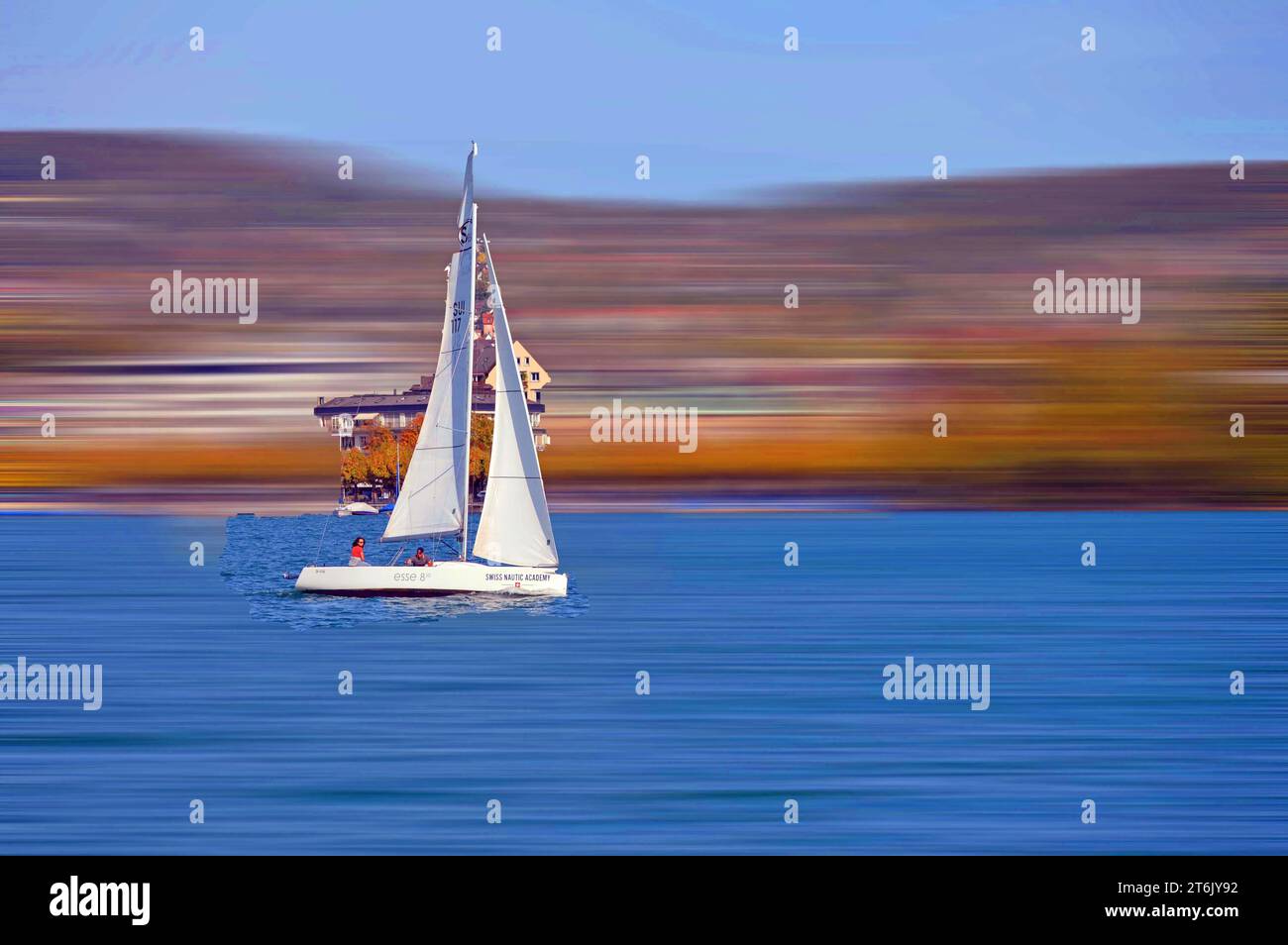 Boat in a lake on supersonic background 1 Stock Photo - Alamy