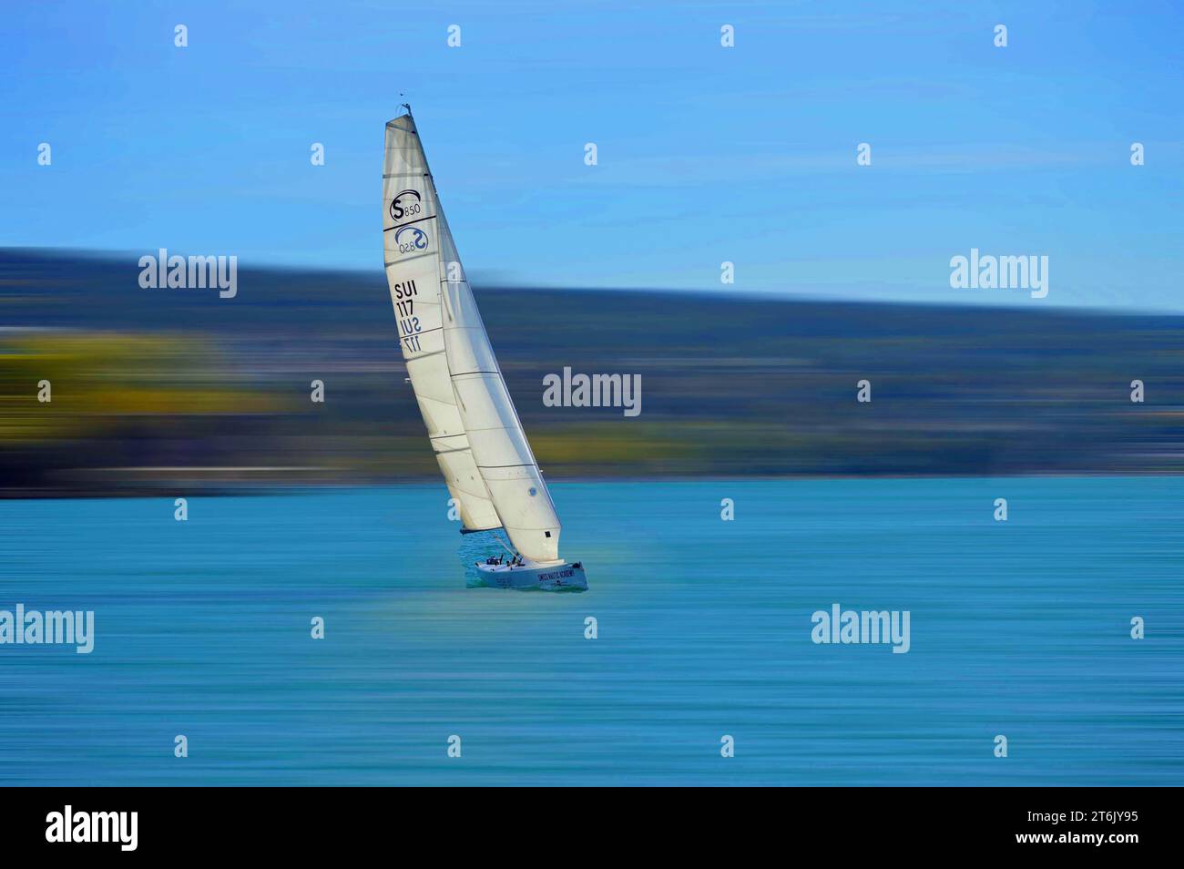 Boat in a lake on supersonic background 2 Stock Photo - Alamy