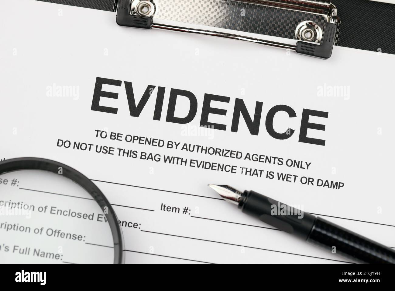 Evidence report blank on A4 tablet lies on office table with pen and ...