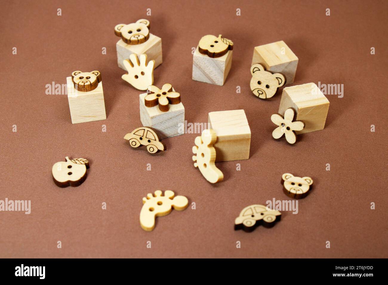 Cubes and beautiful wooden buttons Stock Photo - Alamy