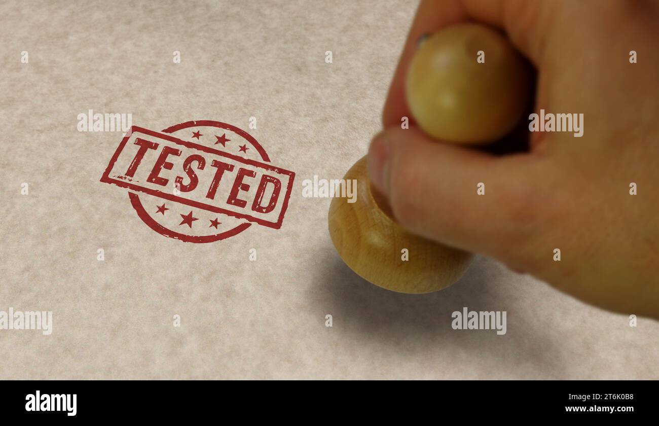 Tested stamp and stamping hand. Check and approved concept Stock Photo ...