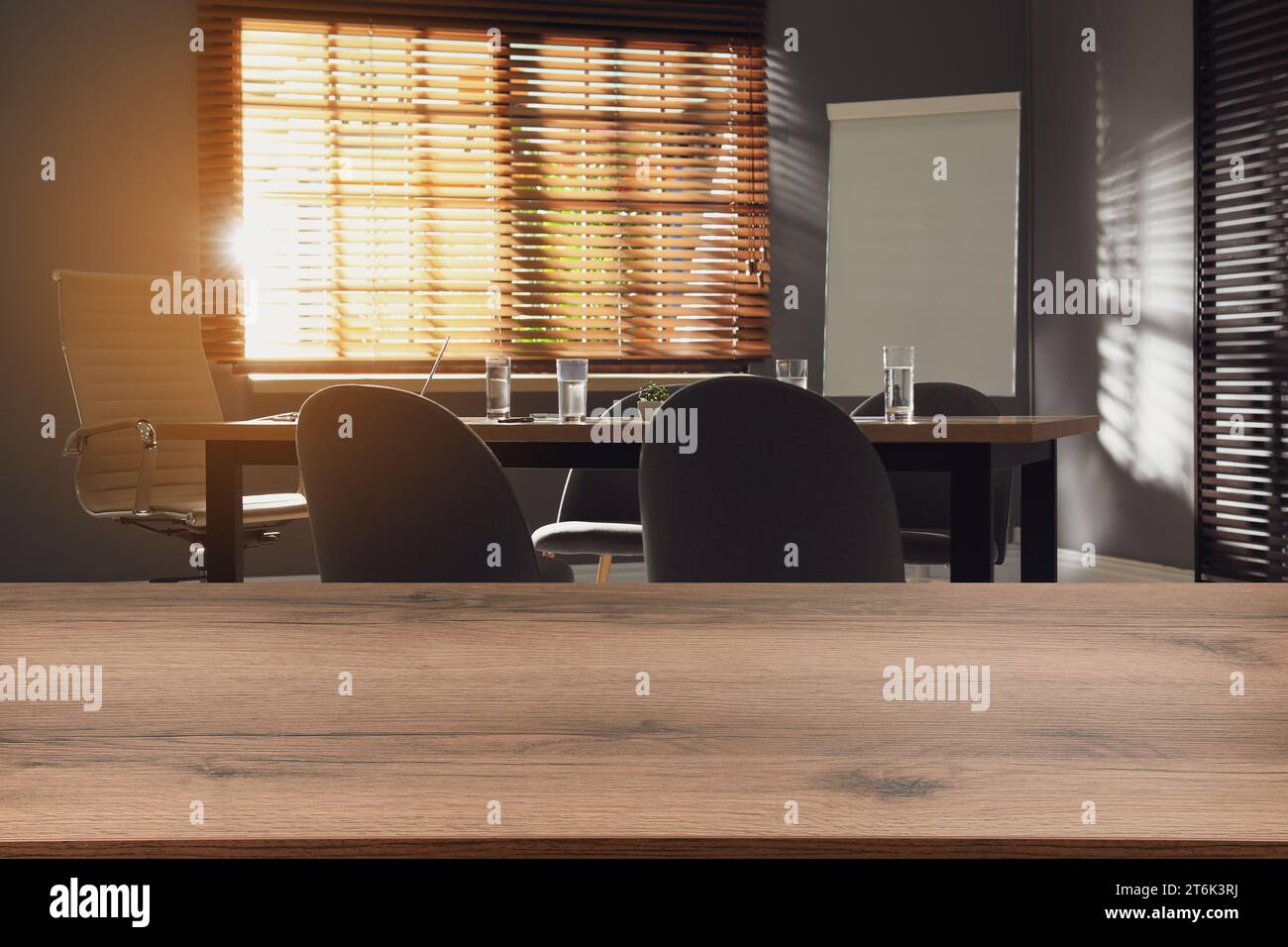 Empty wooden table in comfortable office. Space for design Stock Photo ...