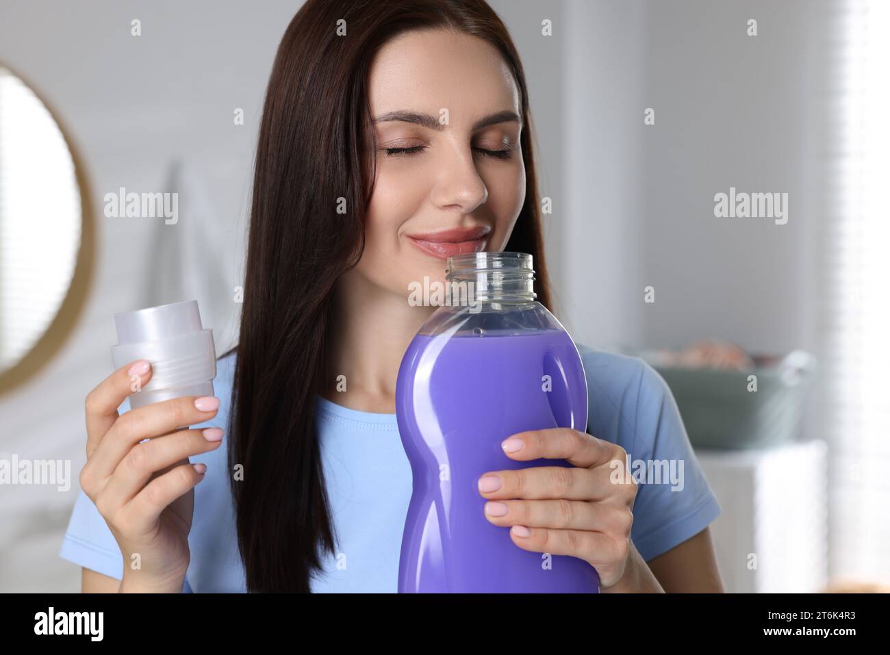 Female smelling fabric hi-res stock photography and images - Alamy