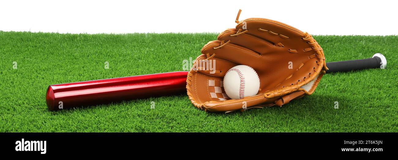 Baseball bat, ball and catcher's mitt on artificial grass against white ...