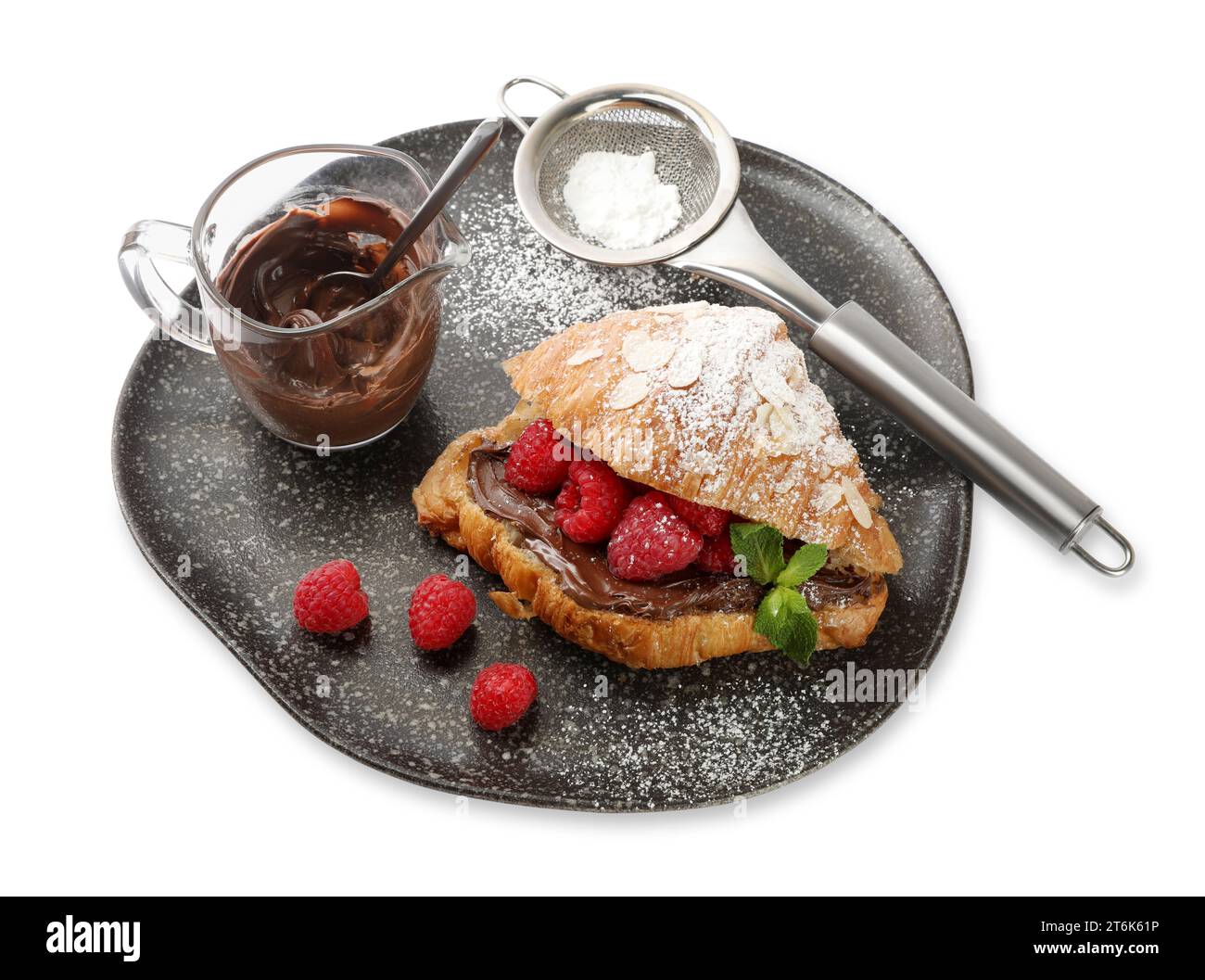 Delicious croissant with raspberries, chocolate and powdered sugar ...
