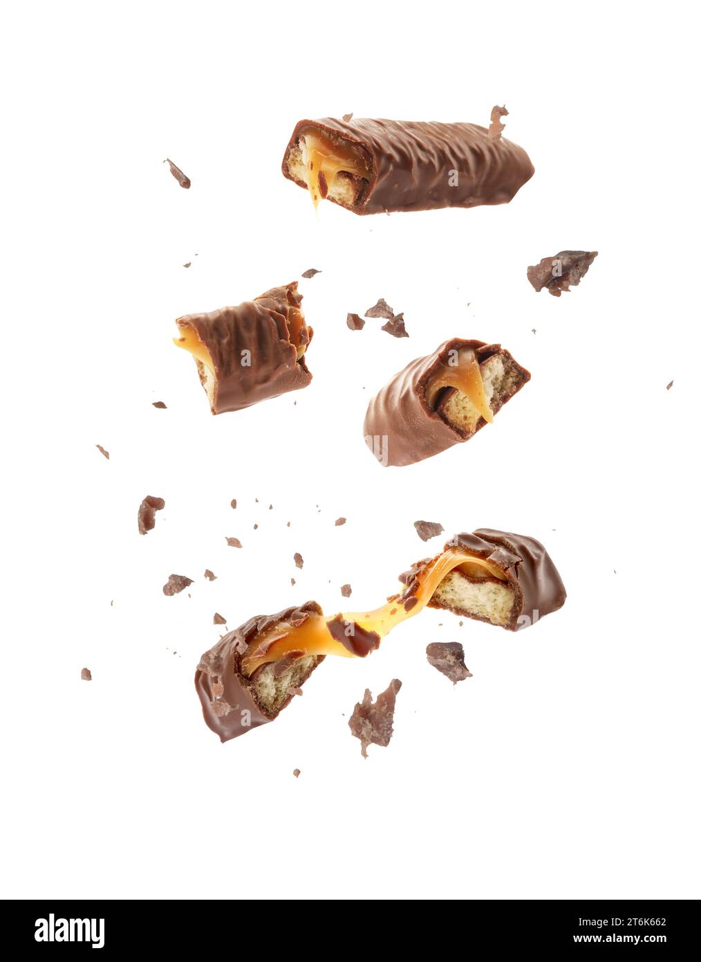 Pieces of chocolate bars with caramel falling on white background Stock ...