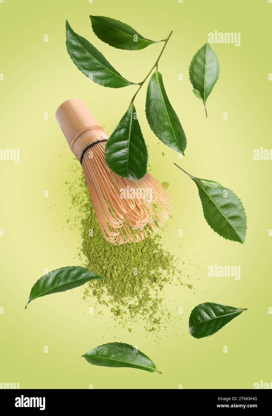 Matcha powder, whisk and leaves falling on light green background Stock ...