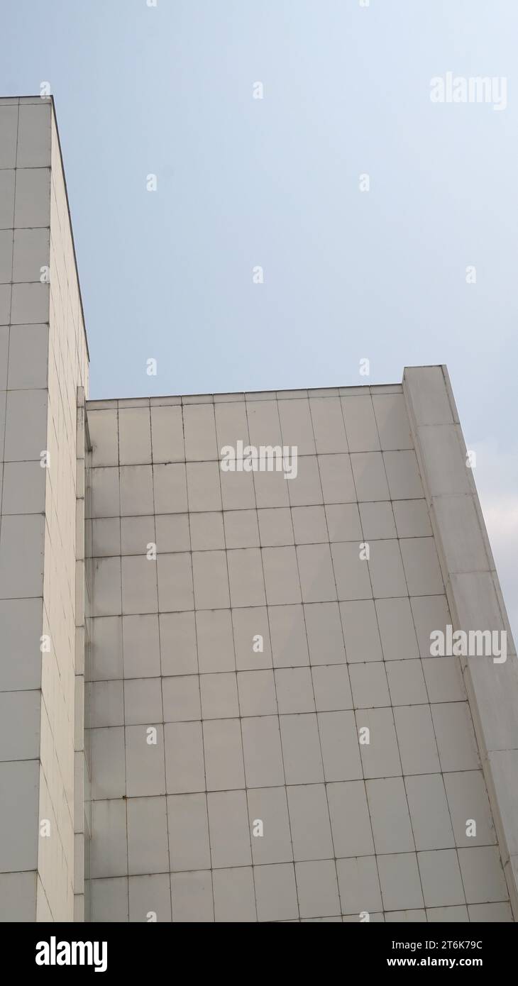 tall white building with a rectangular pattern Stock Photo - Alamy