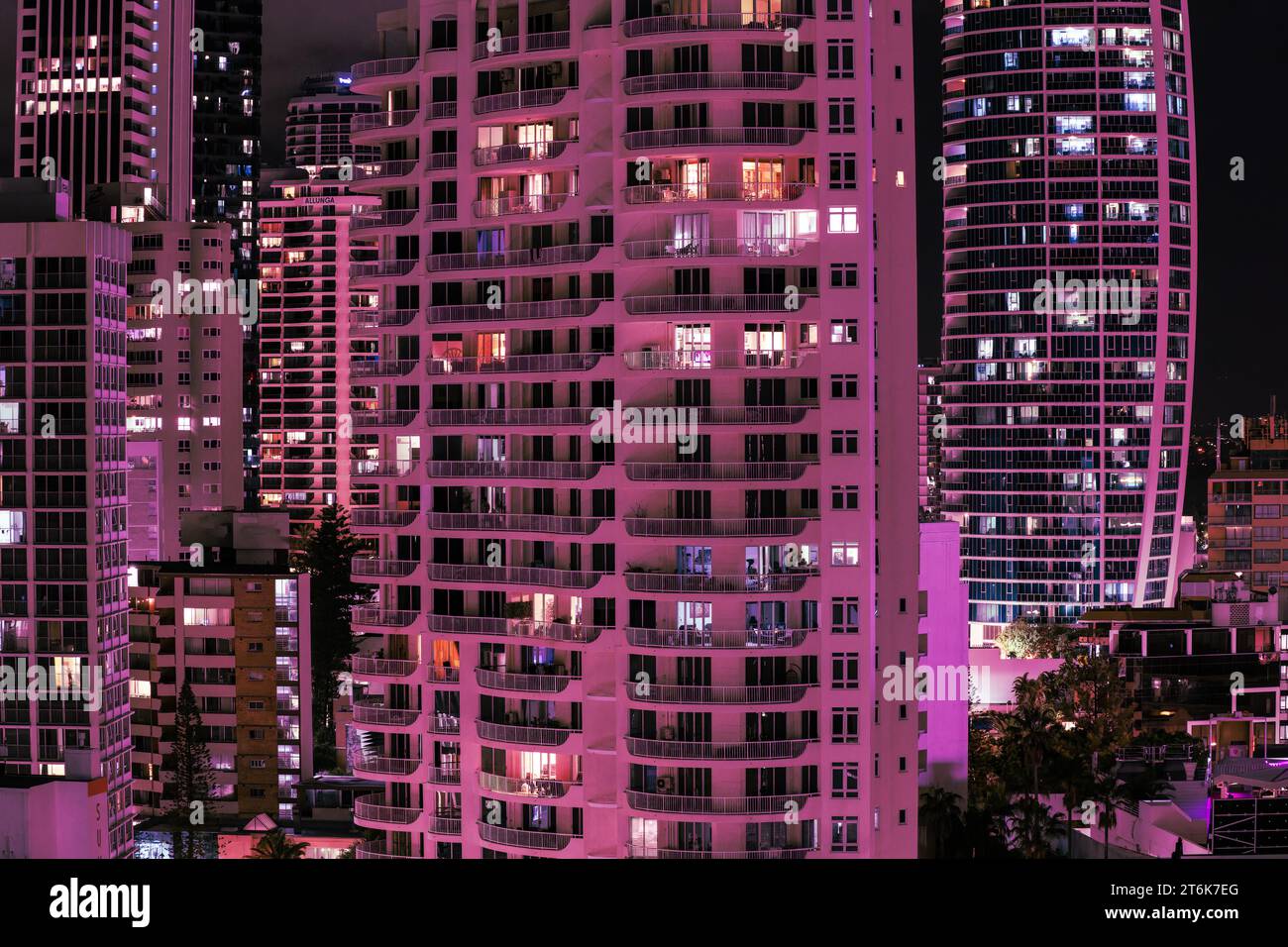Building facades at night with patterns created by lights,and dark ...