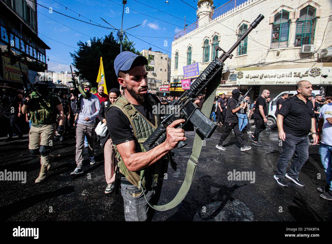 Armed Palestinian militants attend the funeral ceremony of a militant ...