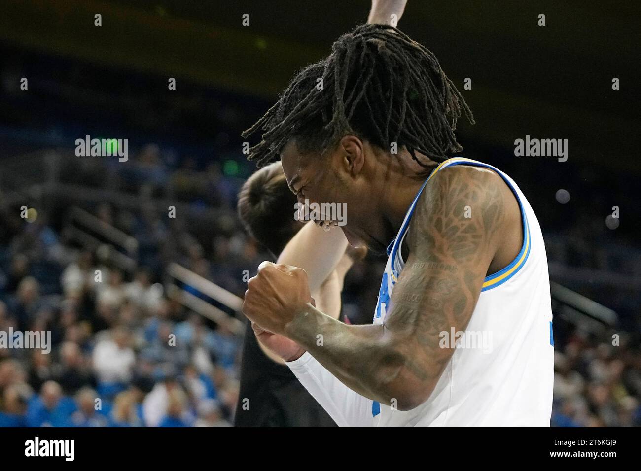 UCLA guard Sebastian Mack celebrates after scoring during the second ...