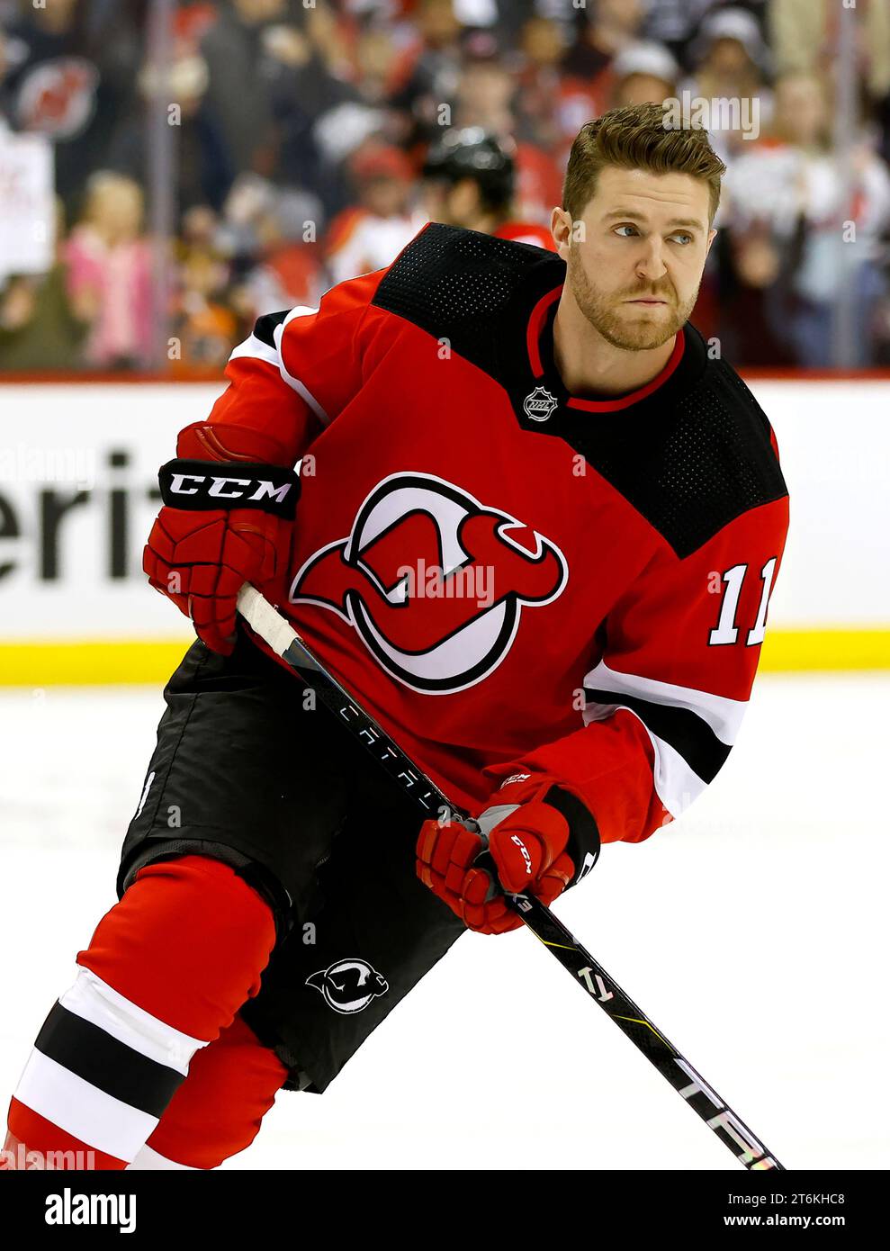 New Jersey Devils center Chris Tierney (11) skates during warm up ...