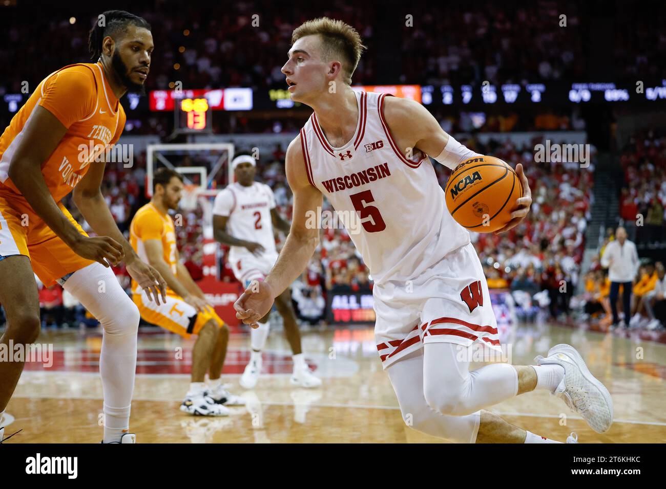 November 10, 2023: Wisconsin Badgers forward Tyler Wahl (5) drives to ...