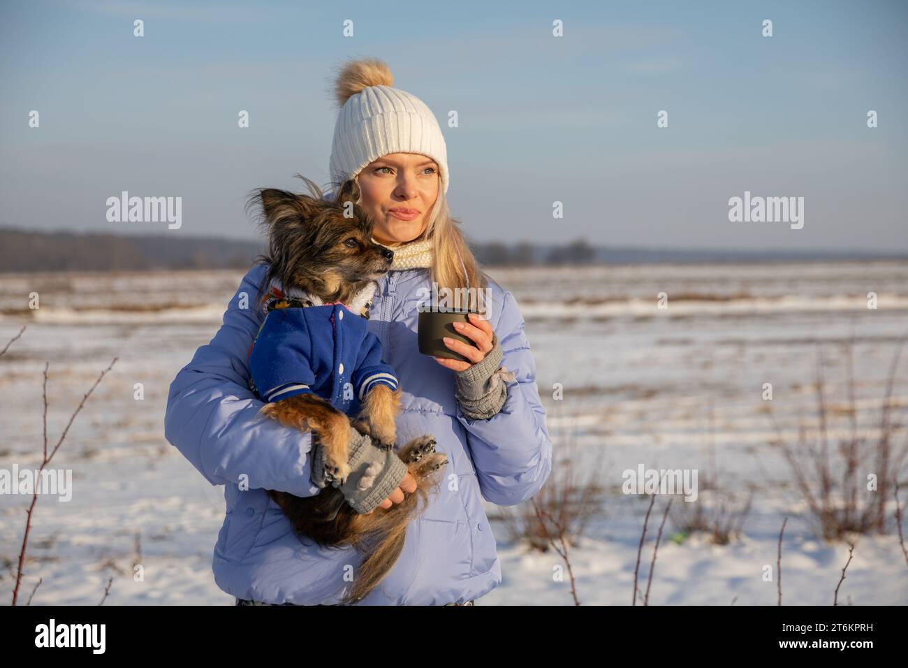 A young girl walking her dog lost her way Stock Photo - Alamy