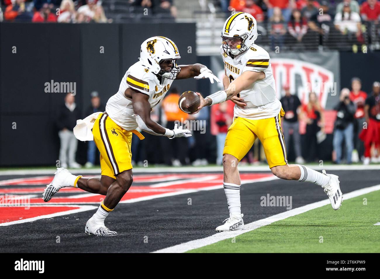 November 10, 2023: Wyoming Cowboys quarterback Andrew Peasley (6) hands ...