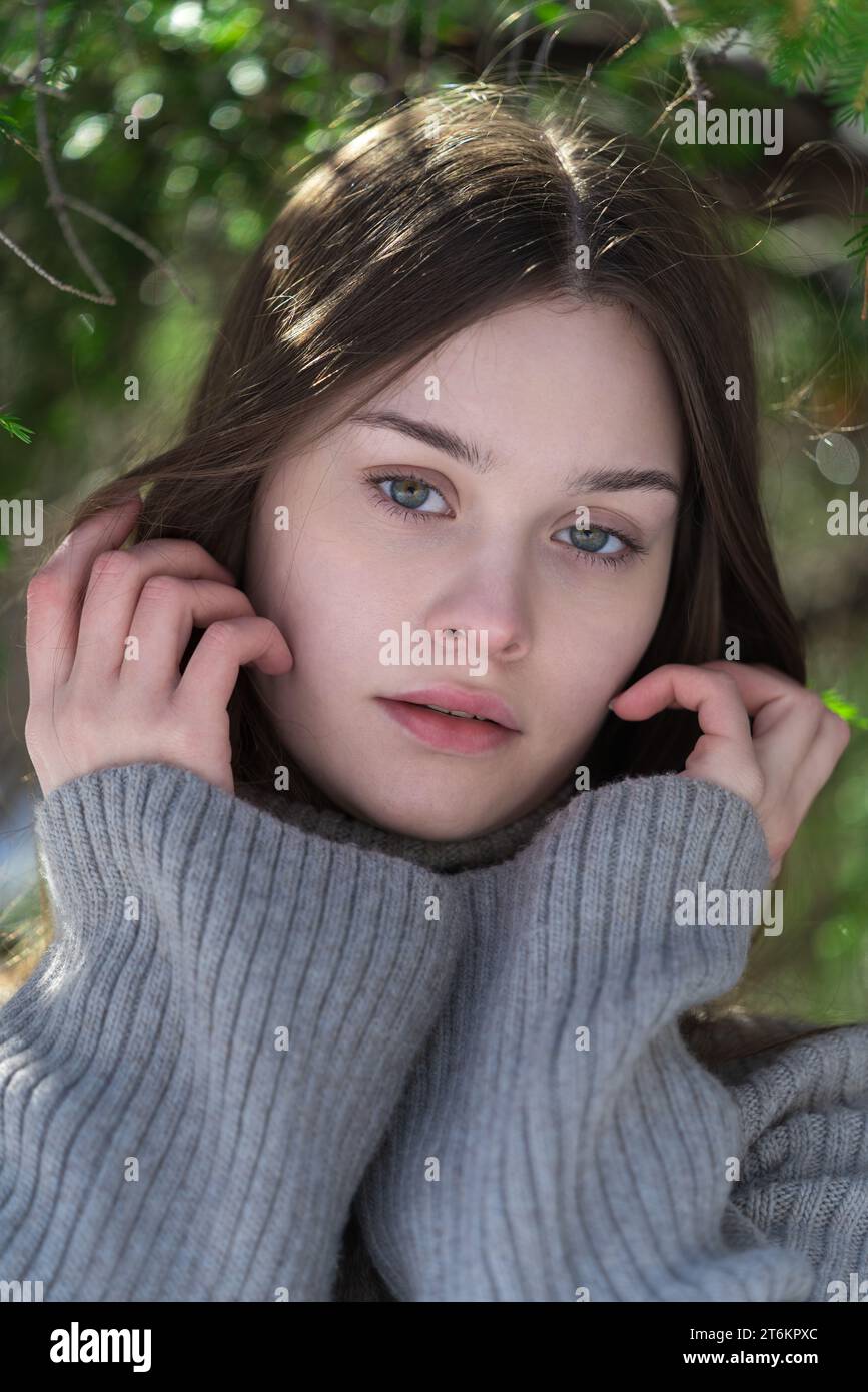 Headshot of teen girl generation z looking at camera. Teenage with long ...