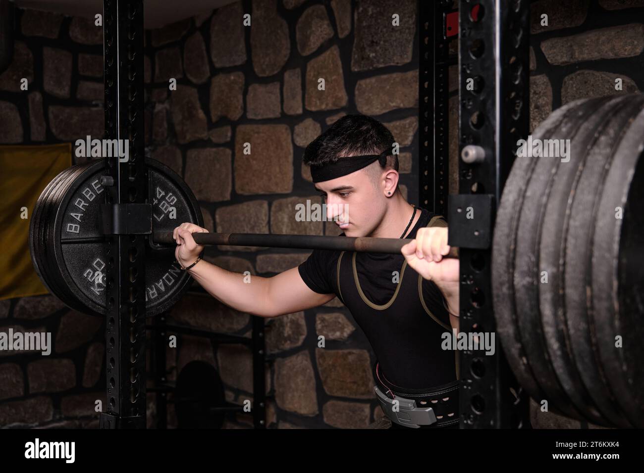 Lifting heavy stone hi-res stock photography and images - Alamy