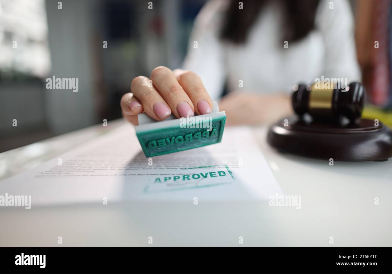 Person puts stamp on document hi-res stock photography and images - Alamy