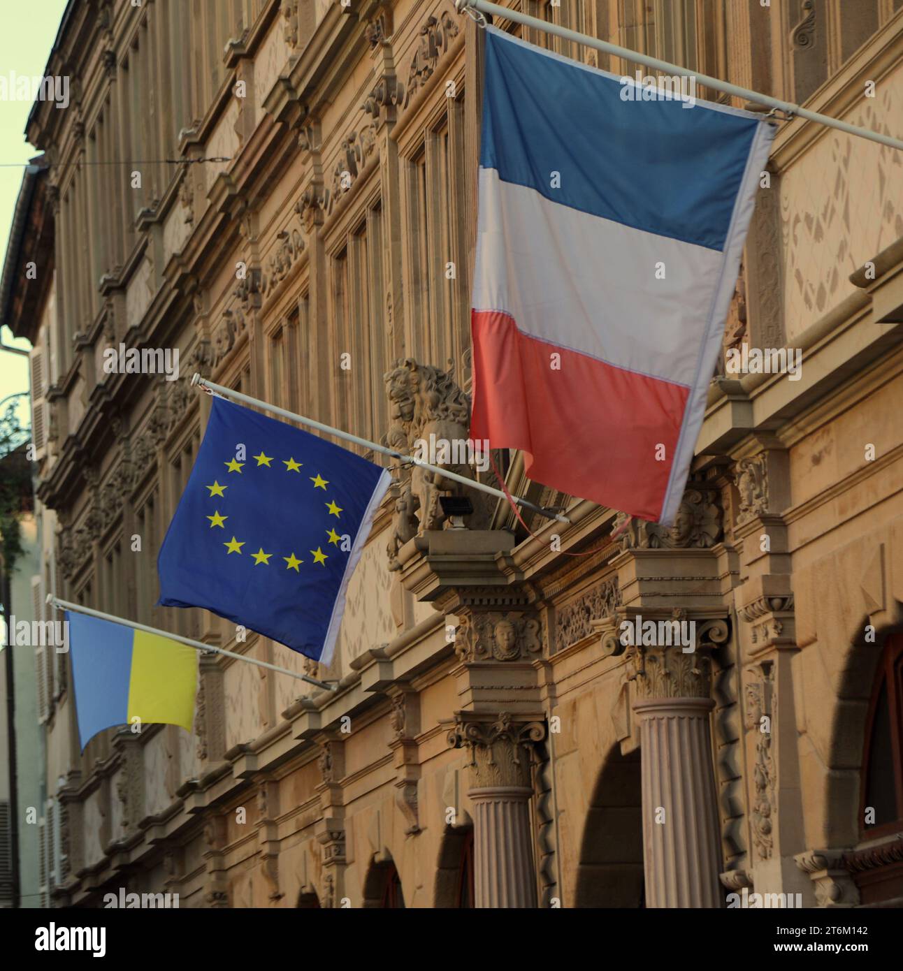 three European and French Ukrainian flags in the ancient palace in ...