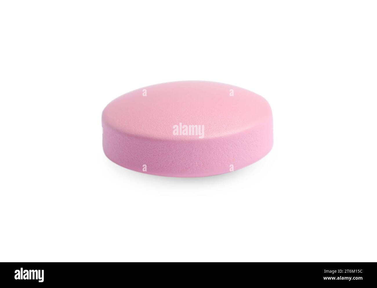 One pink pill on white background. Medicinal treatment Stock Photo - Alamy