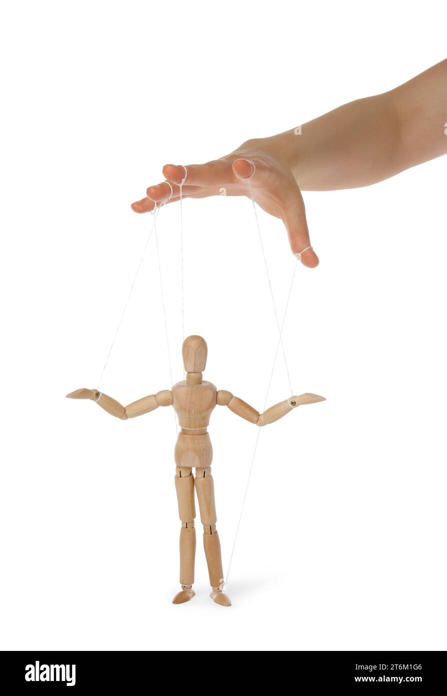 Woman pulling strings of puppet on white background, closeup Stock ...