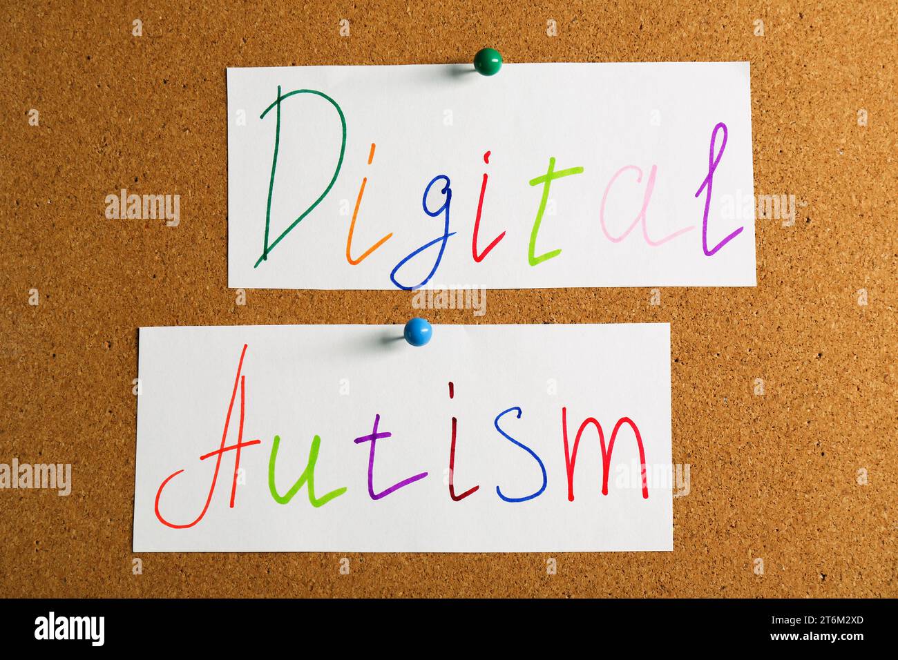 Cards with words Digital Autism pinned on corkboard Stock Photo - Alamy