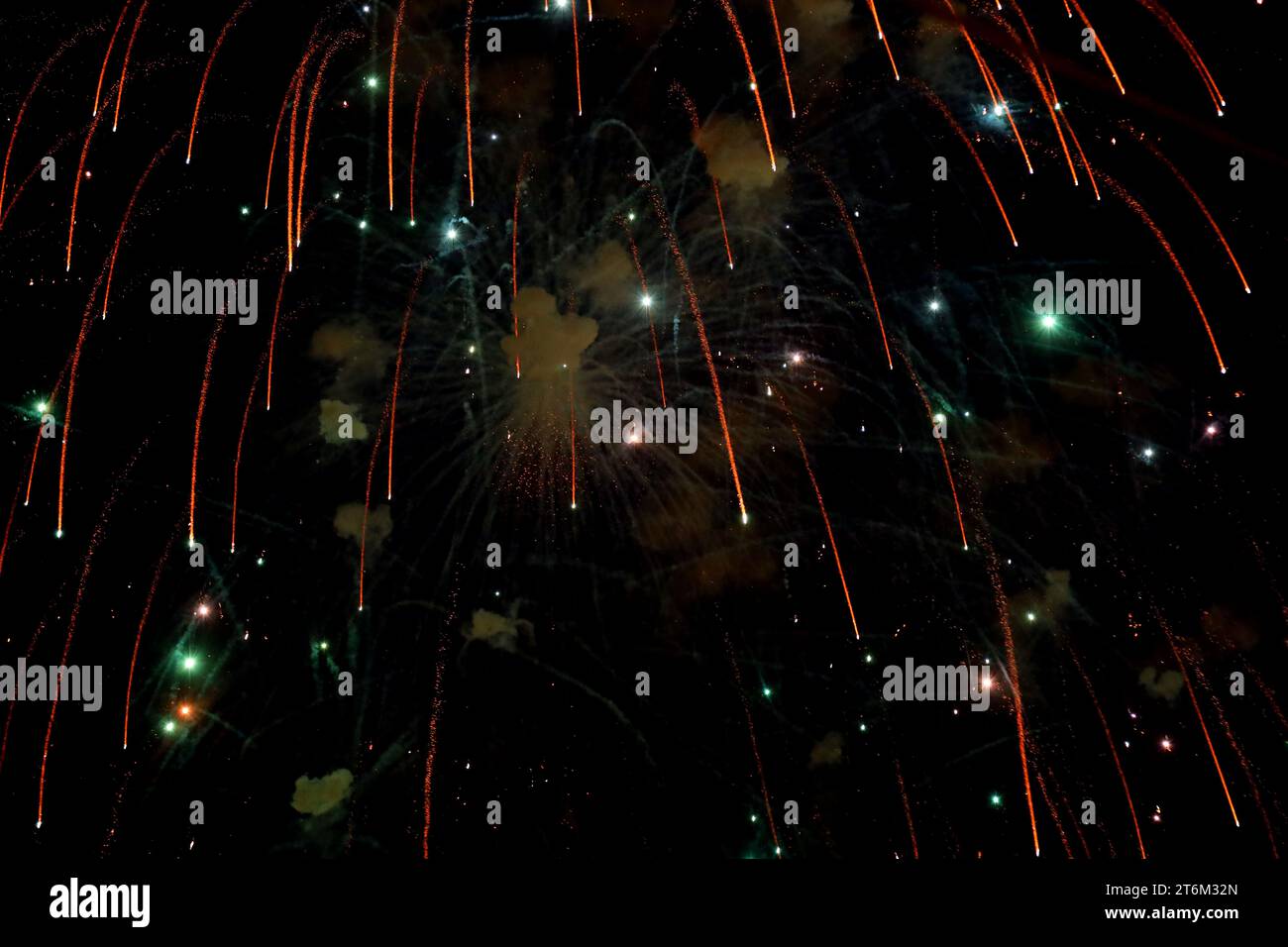 fireworks displays with colorful explosions in the night during the ...