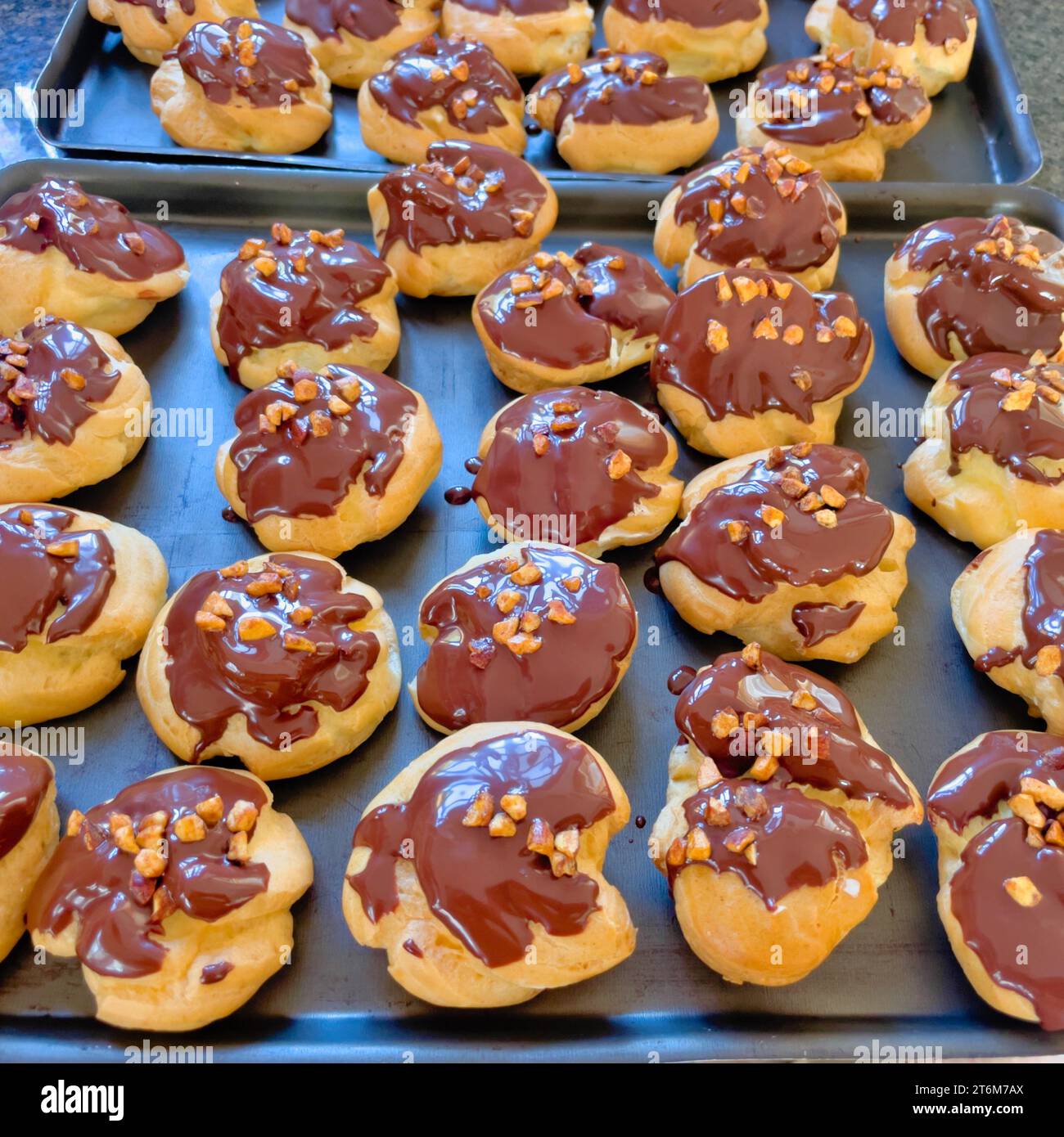 Homemade vanilla cream puff, choux a la creme with chocolate topping ...