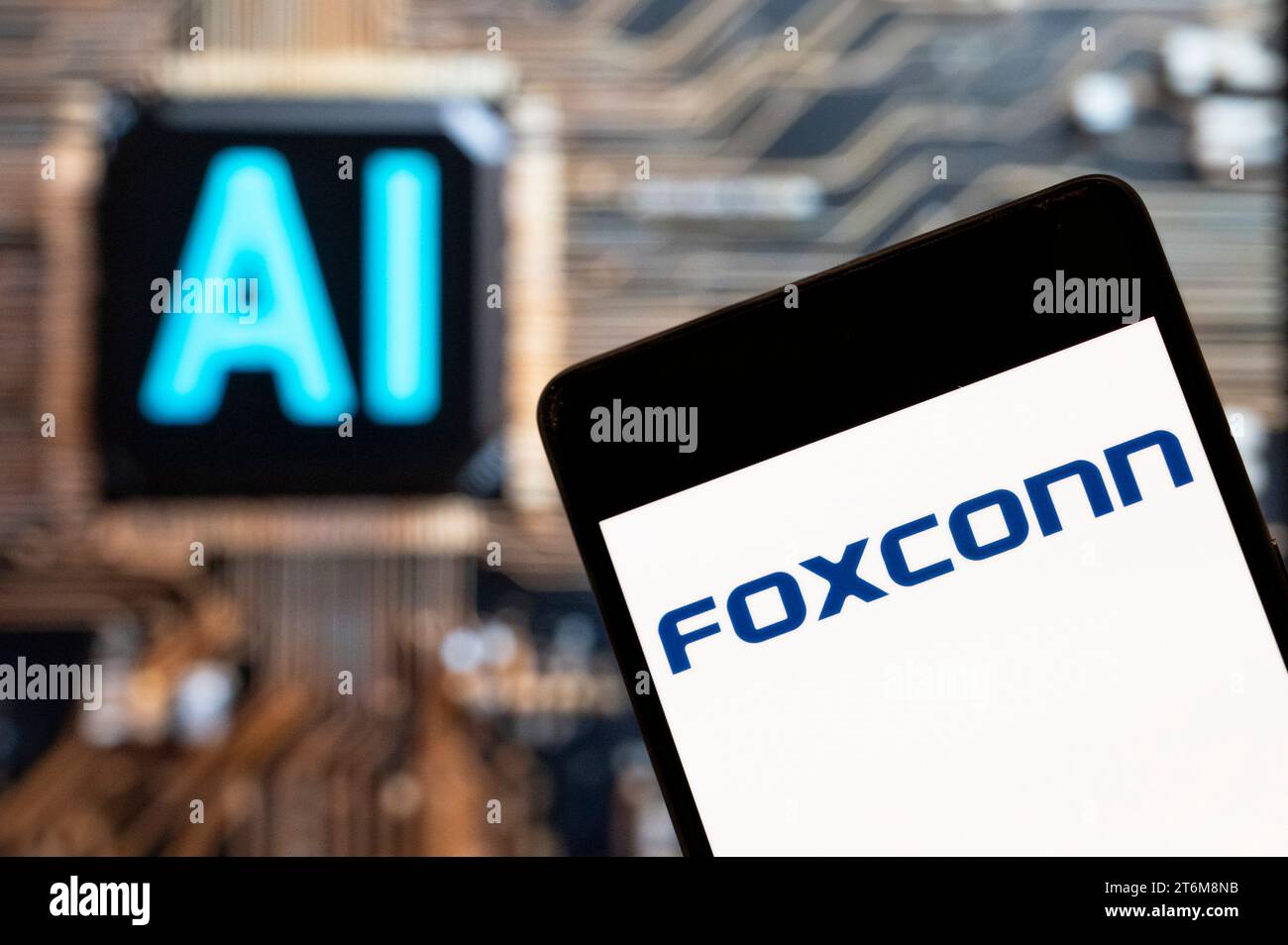 In this photo illustration, the world's largest contract maker of electronics, Foxconn, logo ...